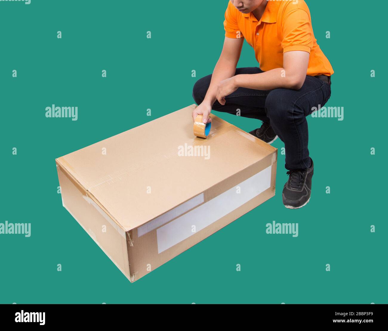 Caucasian man taping cardboard box hi-res stock photography and images ...