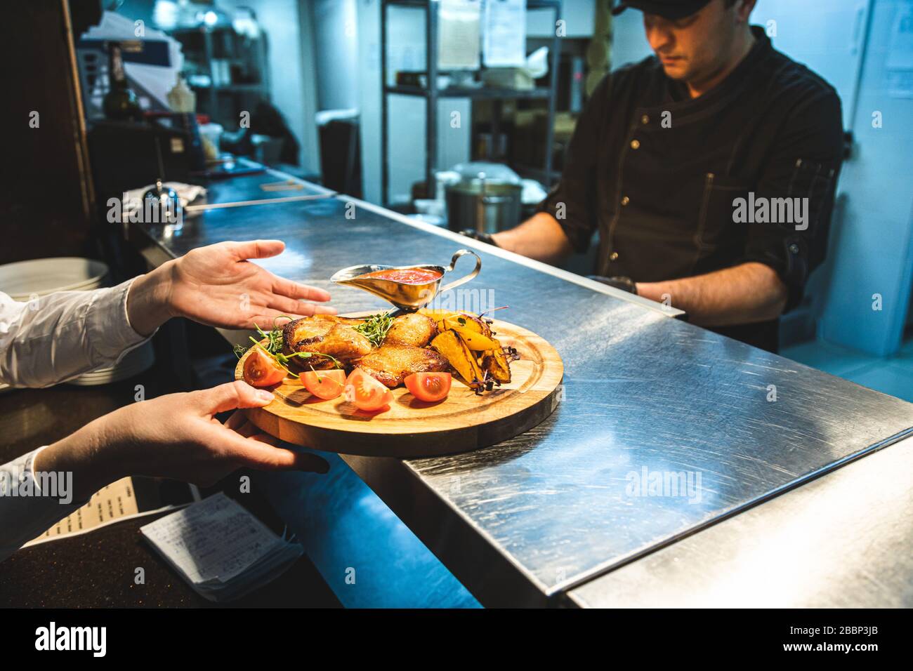 Male waiters hi-res stock photography and images - Alamy