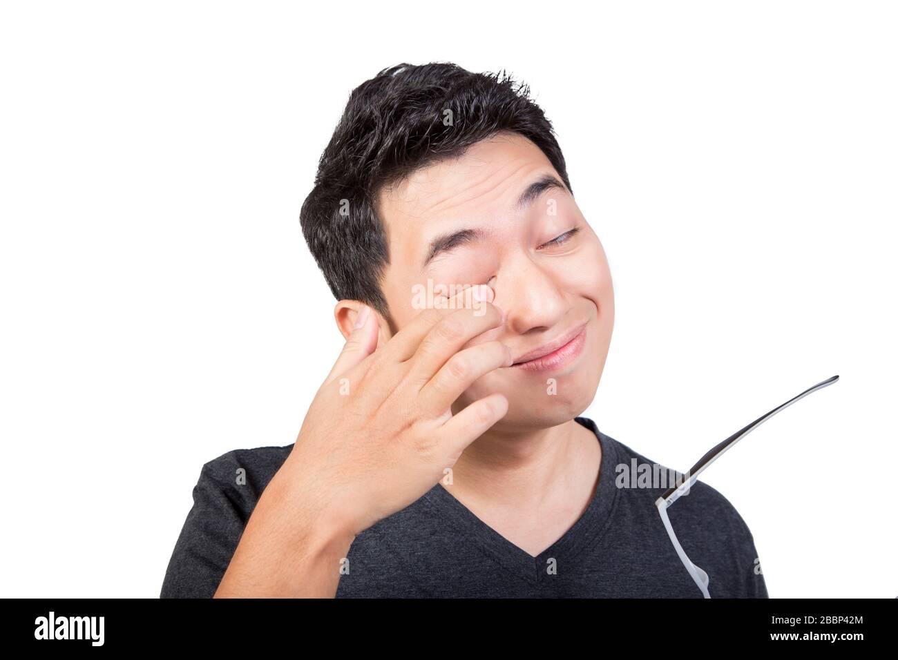 man rub eyes by finger remove dust in eyes isolated on white background ...