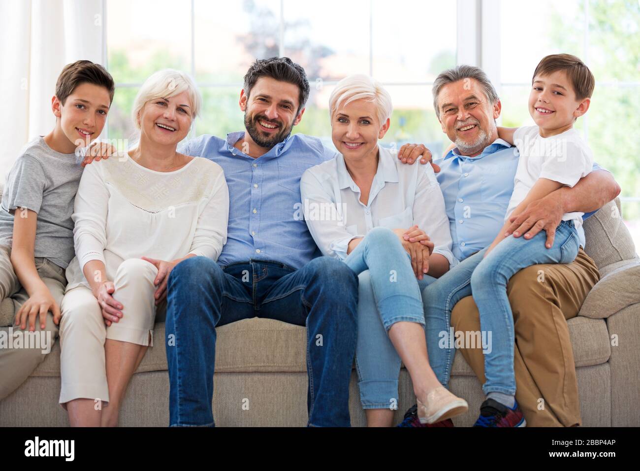 Family of three generations having fun together Stock Photo - Alamy