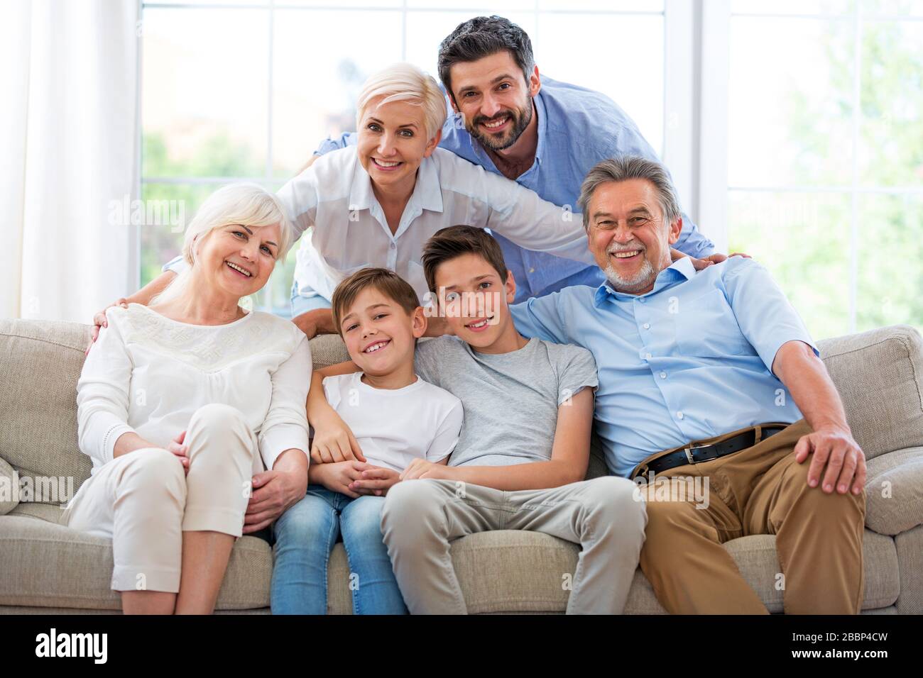 Family of three generations having fun together Stock Photo - Alamy