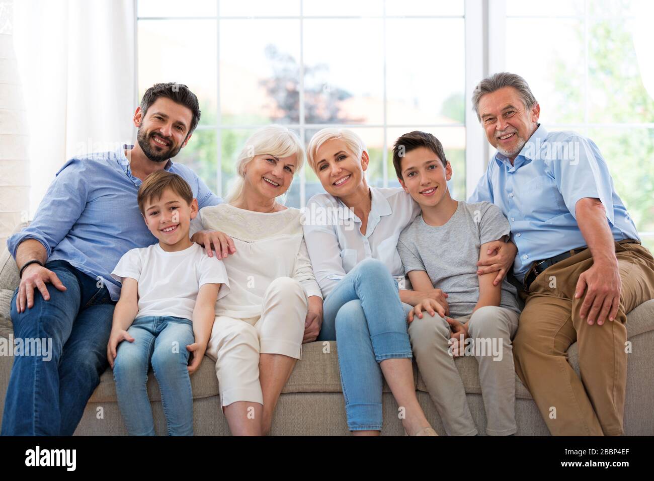 Family of three generations having fun together Stock Photo - Alamy