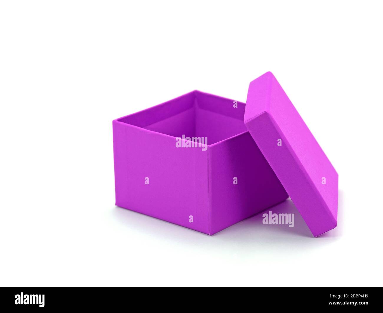 Violet empty cardboard box in front of white background Stock Photo - Alamy