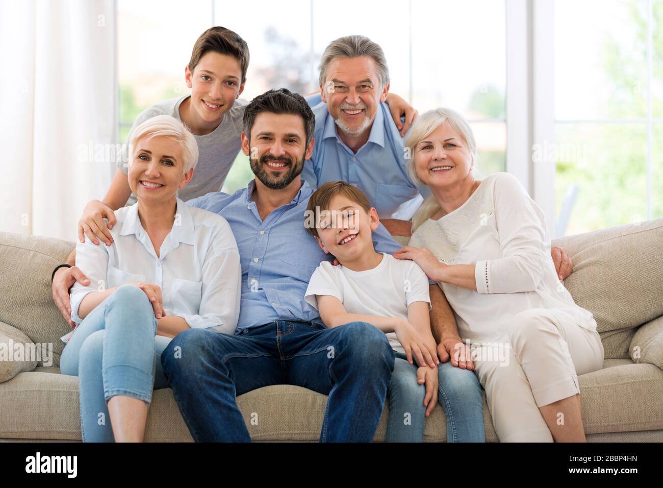 Family of three generations having fun together Stock Photo - Alamy