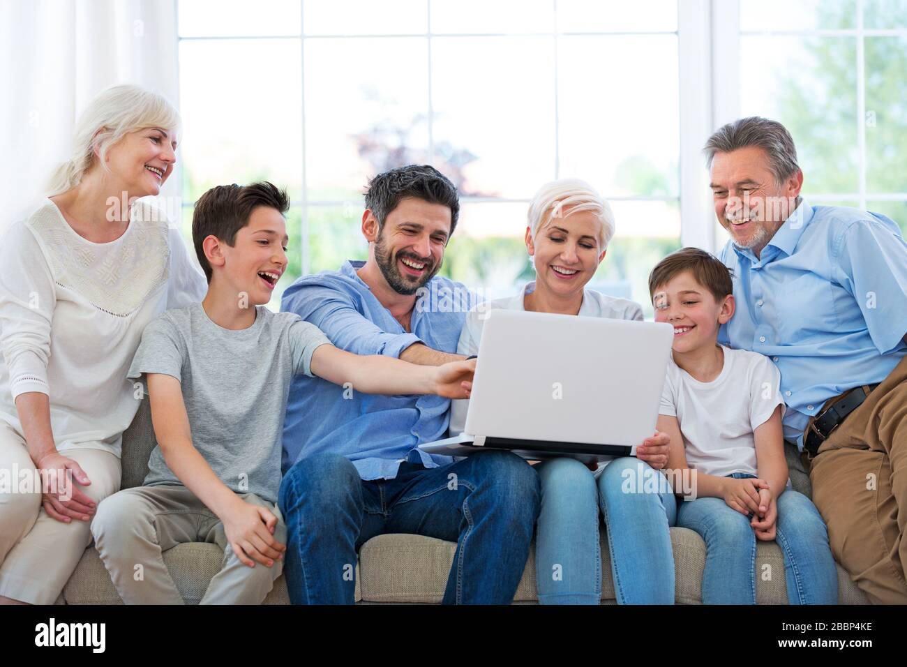 Family of three generations having fun together Stock Photo - Alamy