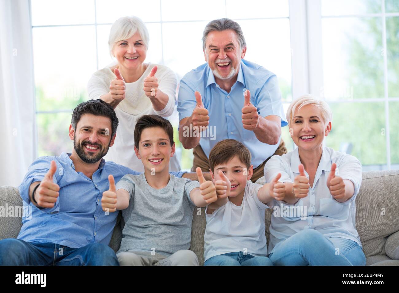 Family of three generations having fun together Stock Photo - Alamy