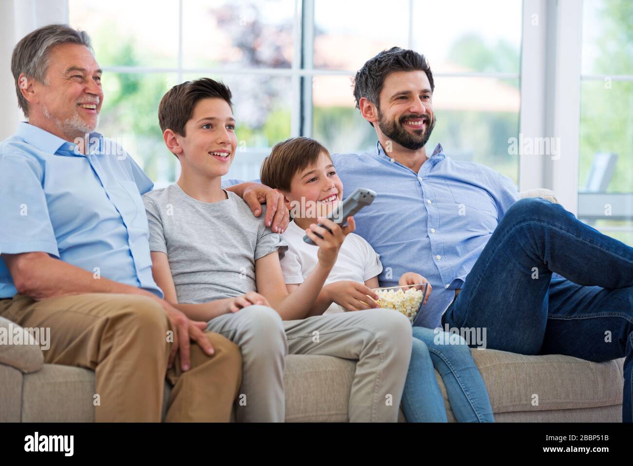 Family of three generations having fun together Stock Photo - Alamy