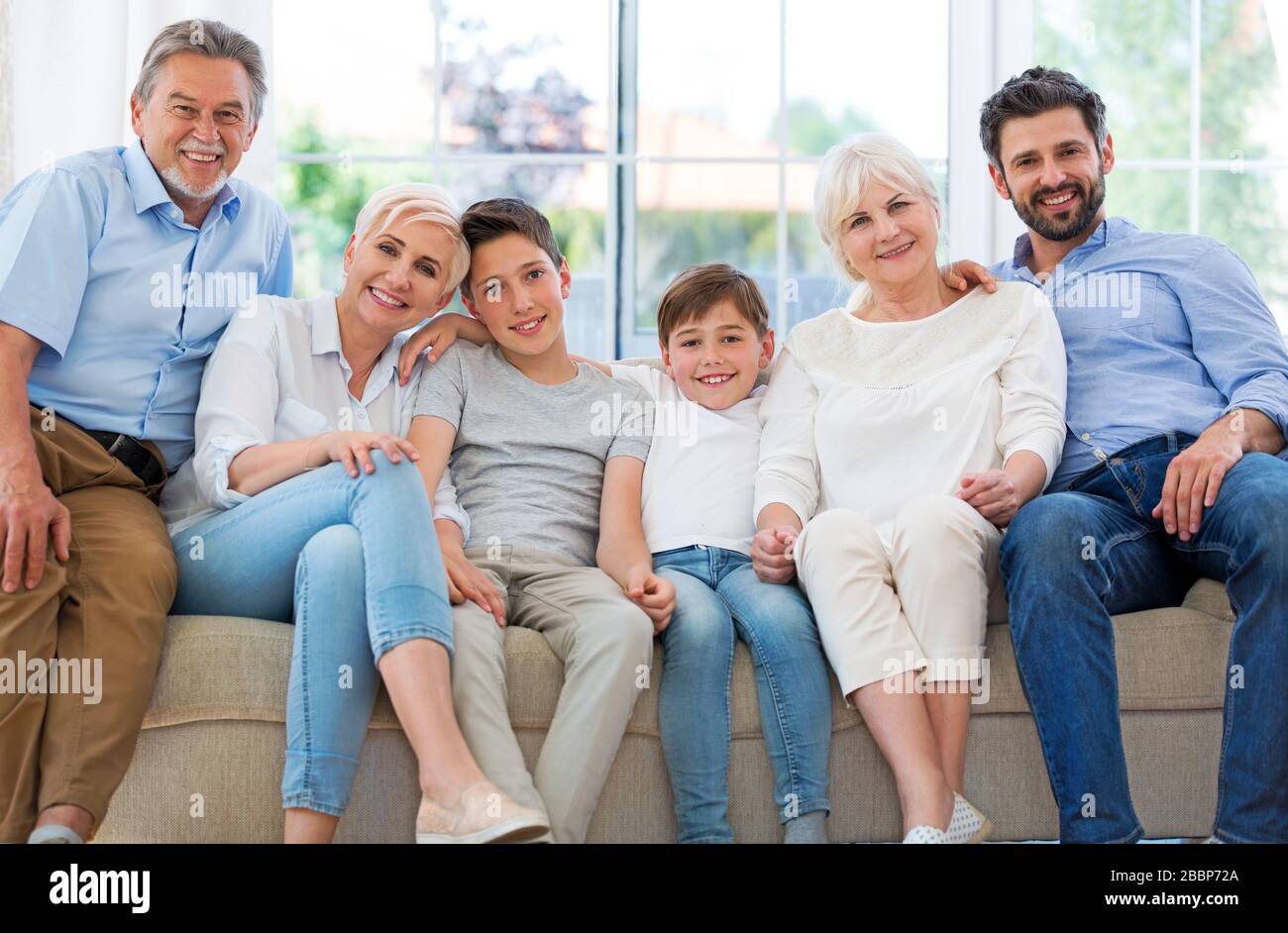 Family of three generations having fun together Stock Photo - Alamy