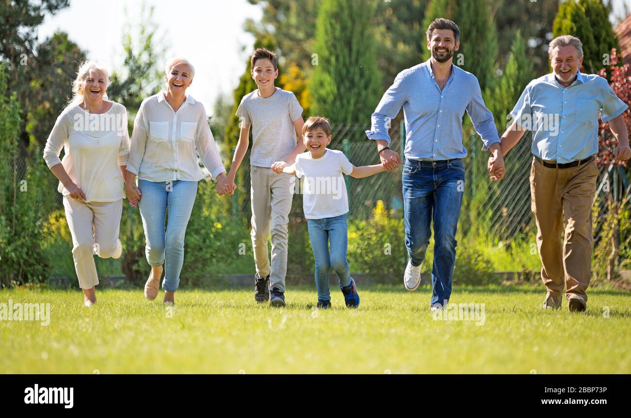 Family of three generations having fun together Stock Photo - Alamy