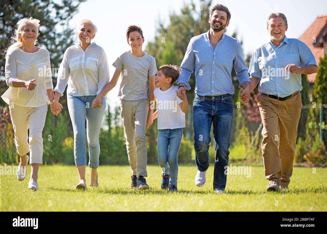 Family of three generations having fun together Stock Photo - Alamy
