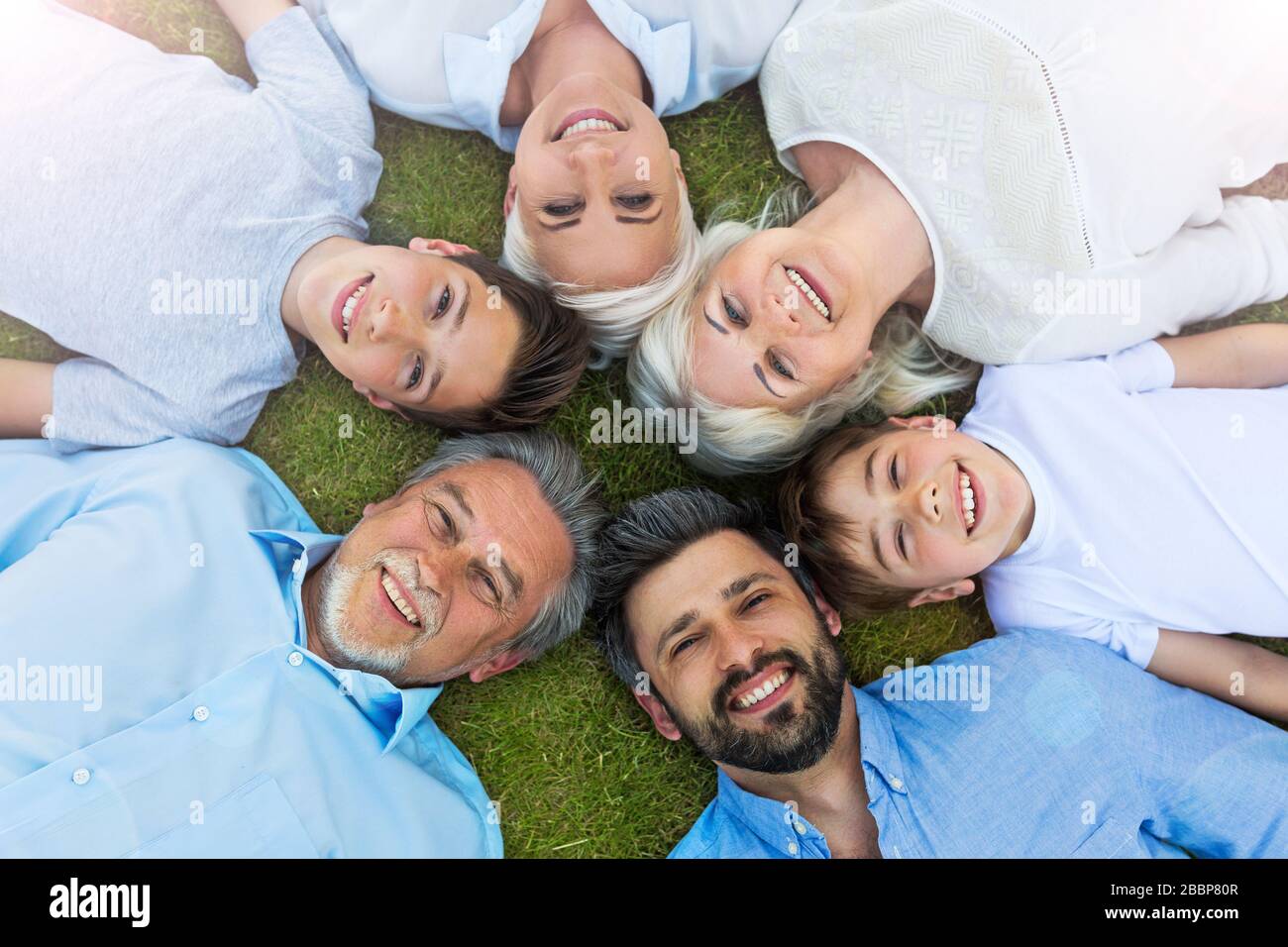 Family of three generations having fun together Stock Photo - Alamy