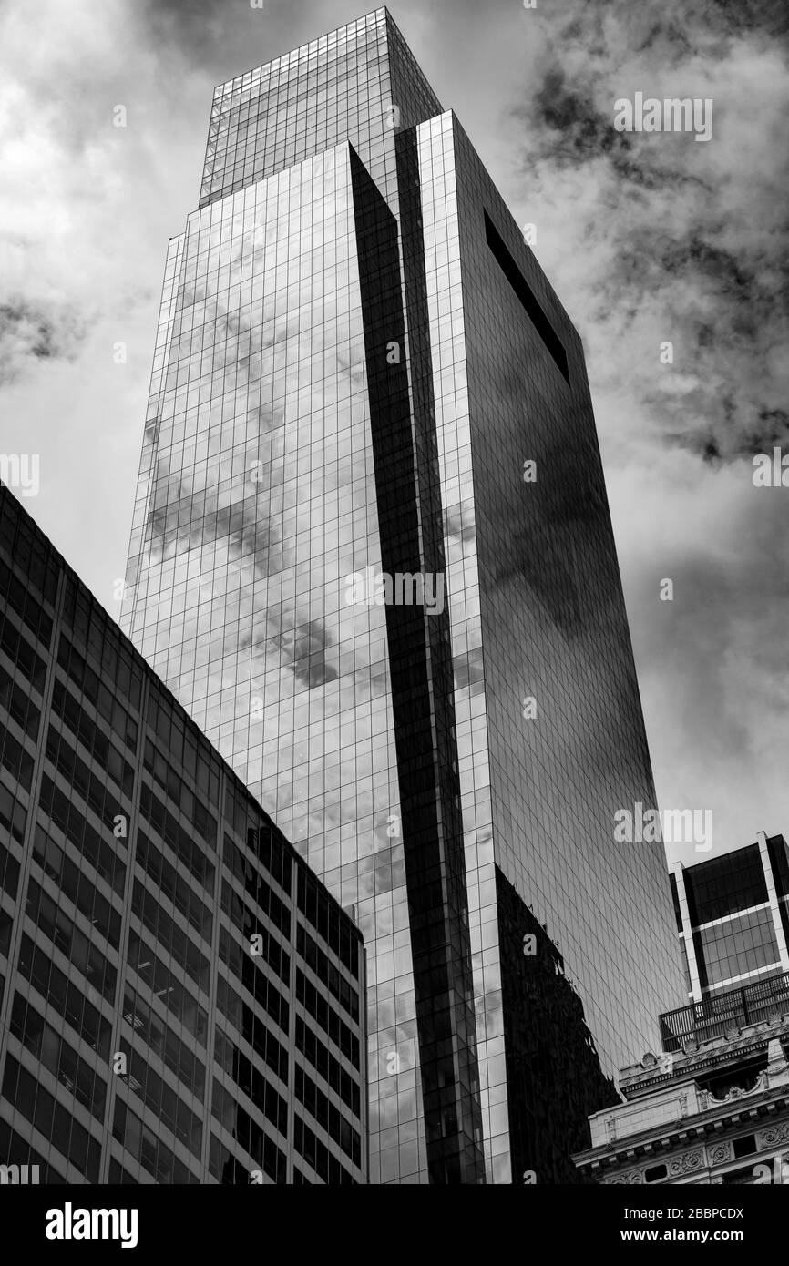 A cloudscape reflected in the glass curtainwall of Philadelphia's ...