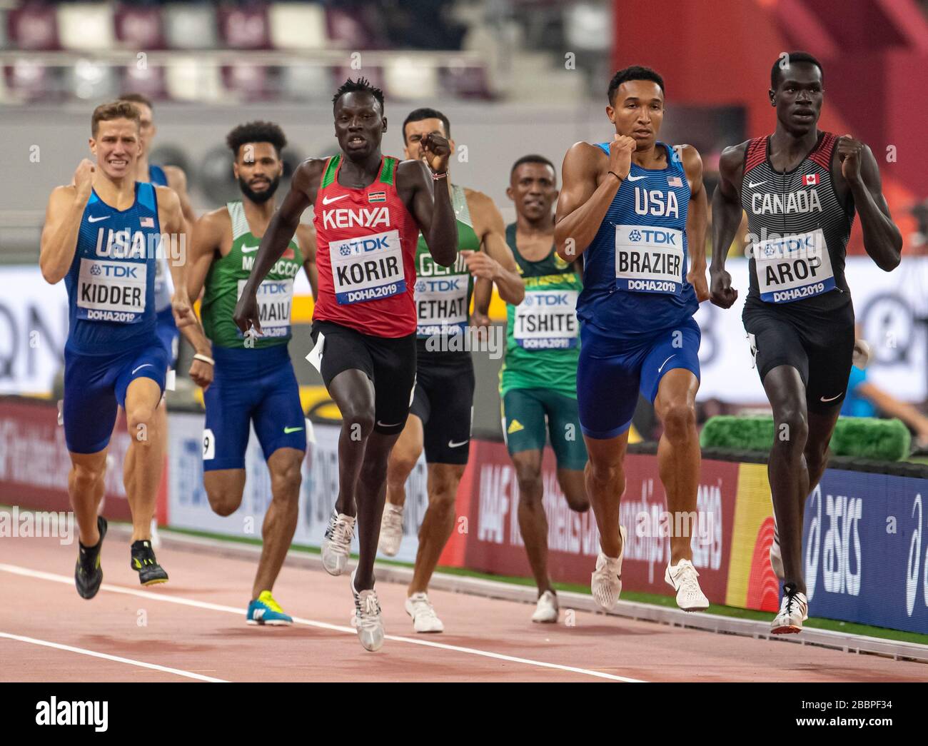 DOHA - QATAR - SEP 29: Brannon Kidder (USA), Emmanuel Kipkurui Korir ...