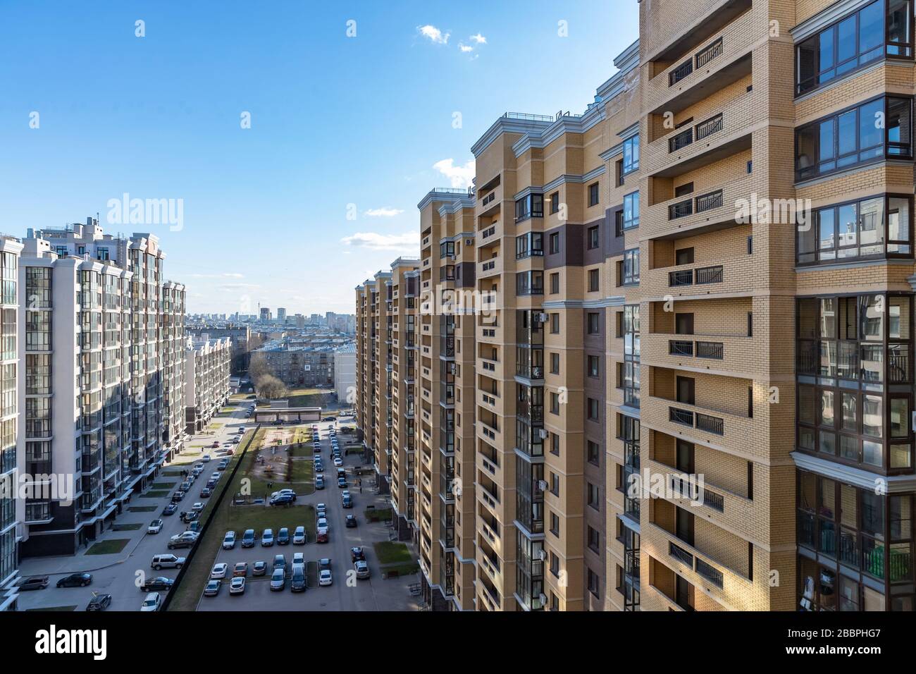 Colourful multi-storey complex of new buildings from balcony, Top view ...