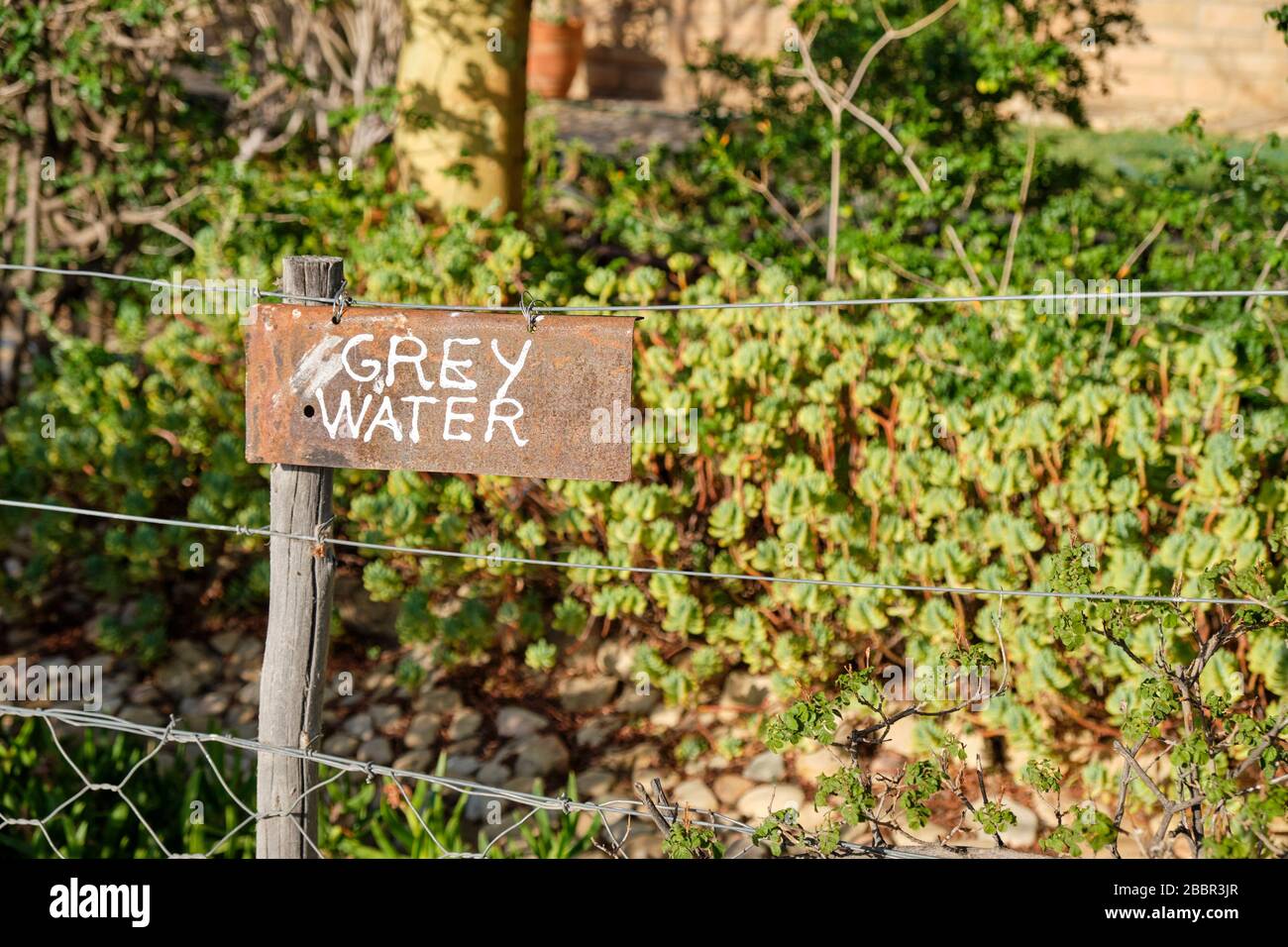 Sign written "Grey Water" to indicate garden is watered with second ...