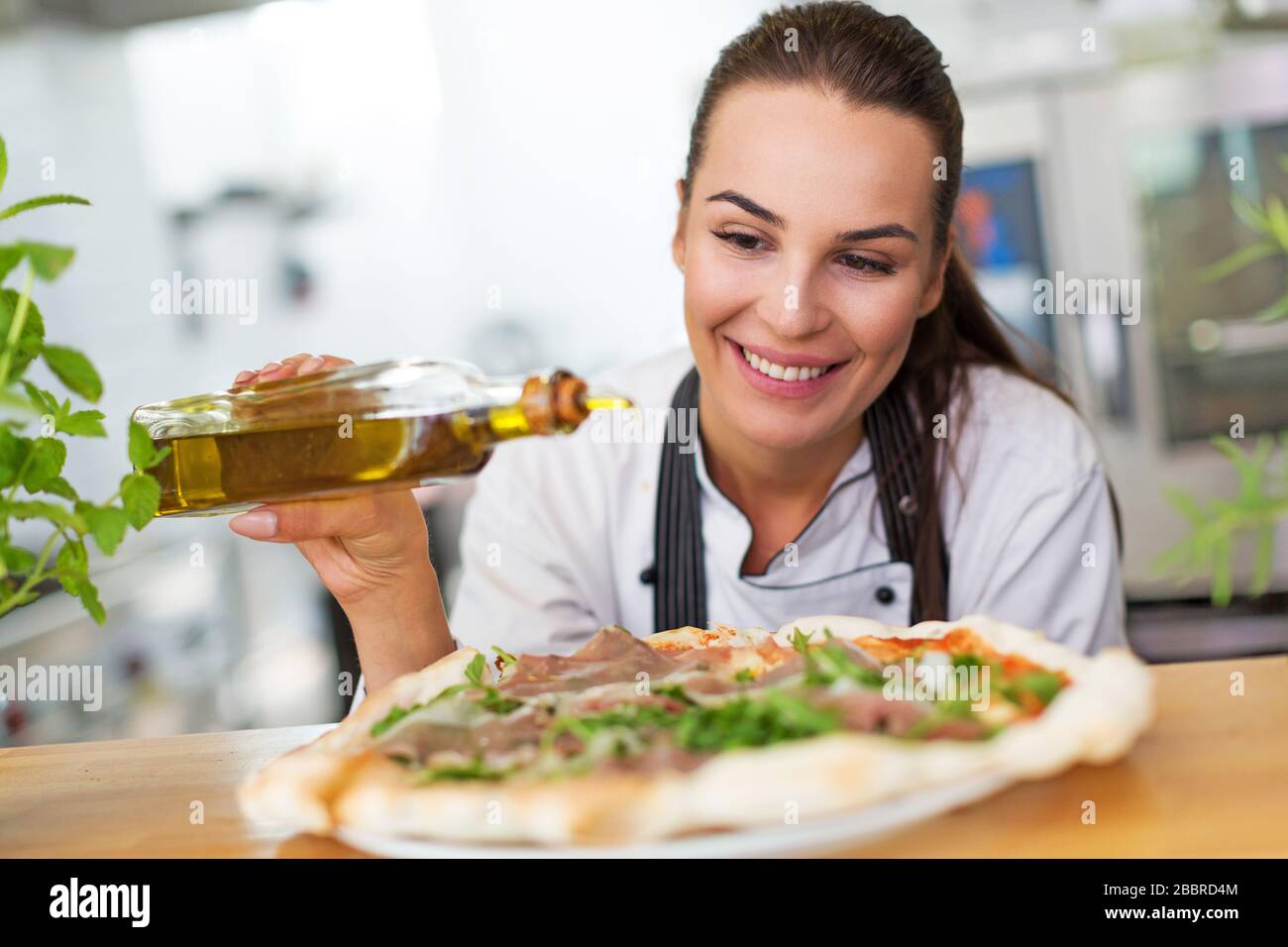 Female chef woman pizza hi-res stock photography and images - Alamy