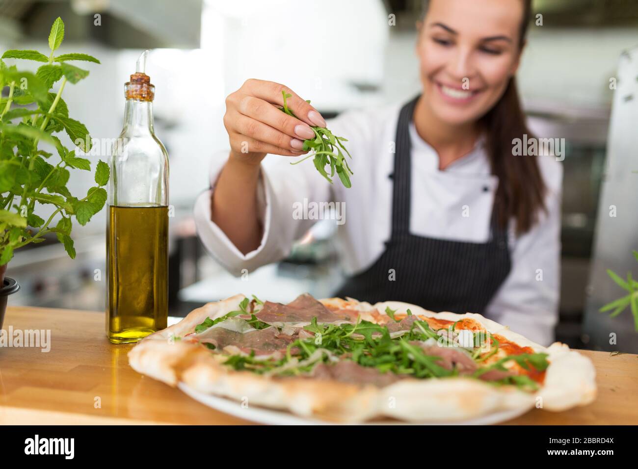 Woman italian kitchen hi-res stock photography and images - Alamy
