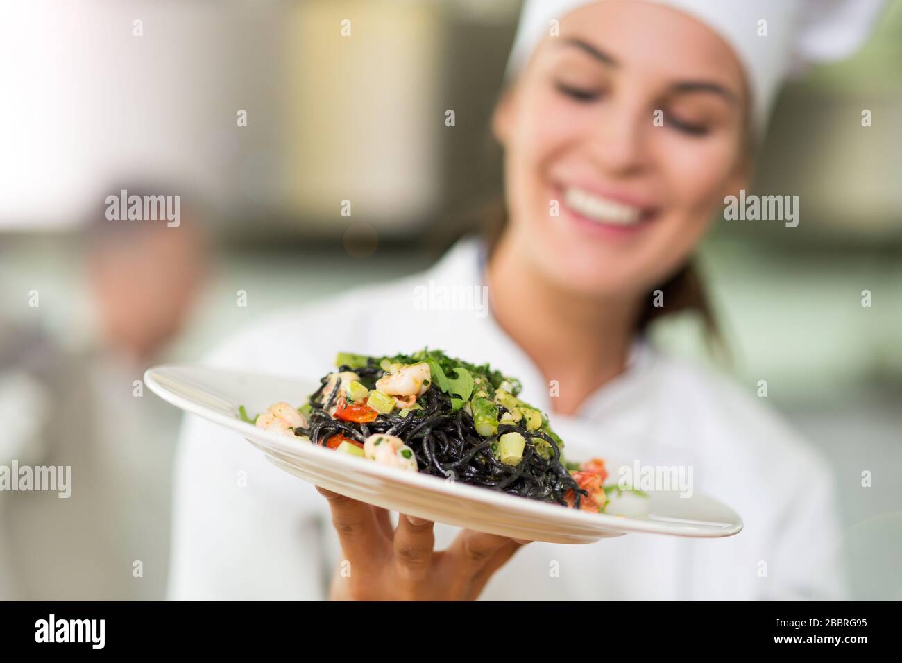 Smiling female restaurant hi-res stock photography and images - Alamy