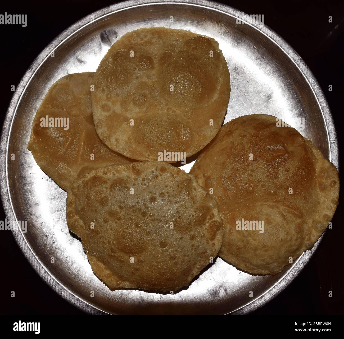 Bengali Luchi or Indian poori closeup. This is an Indian traditional ...