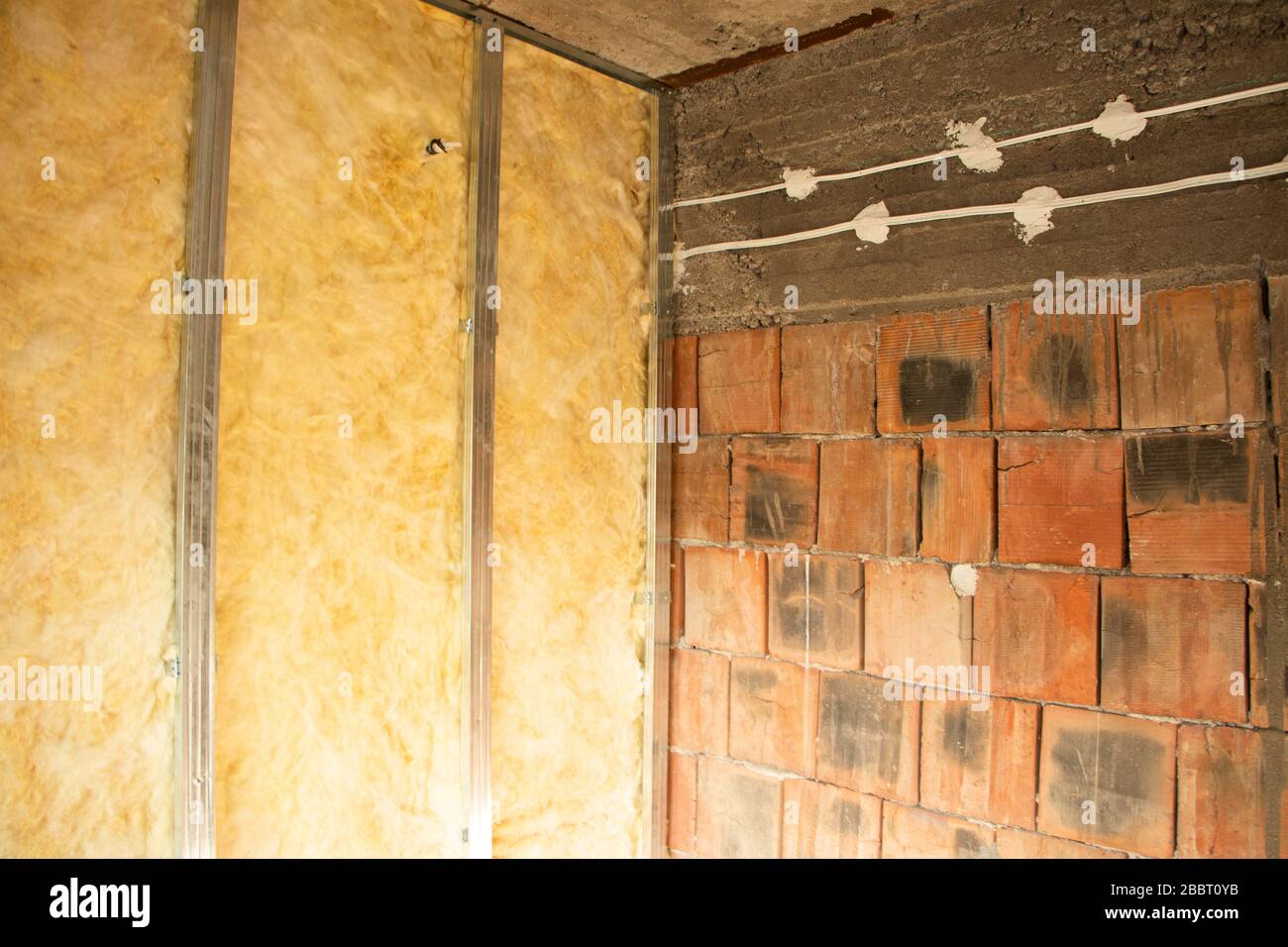 repair of house floor insulation and wall insulation Stock Photo - Alamy