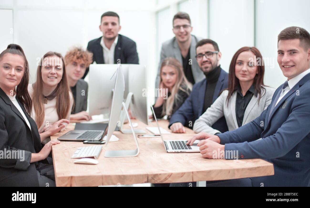 group of young employees in the workplace in the office Stock Photo - Alamy