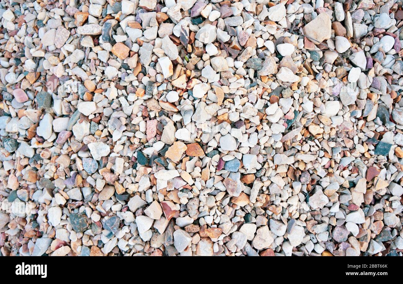 texture of many small stones of different colors, crushed stone, for ...