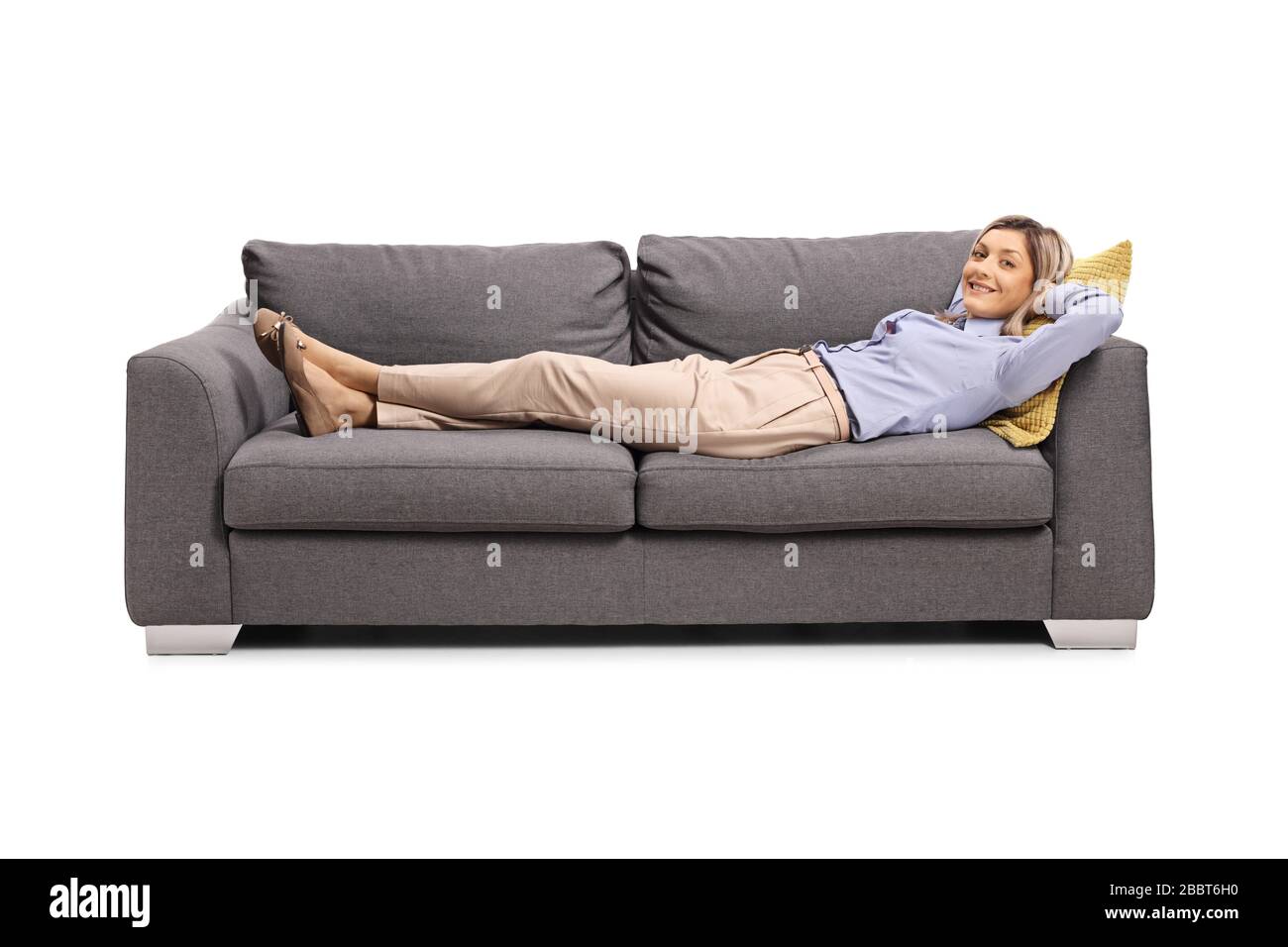 Young woman relaxing on couch Cut Out Stock Images & Pictures - Alamy
