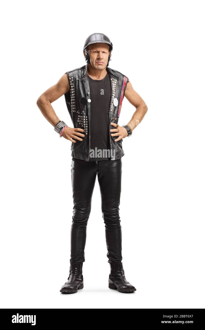 Full length portrait of a grumpy male biker with a helmet isolated on ...