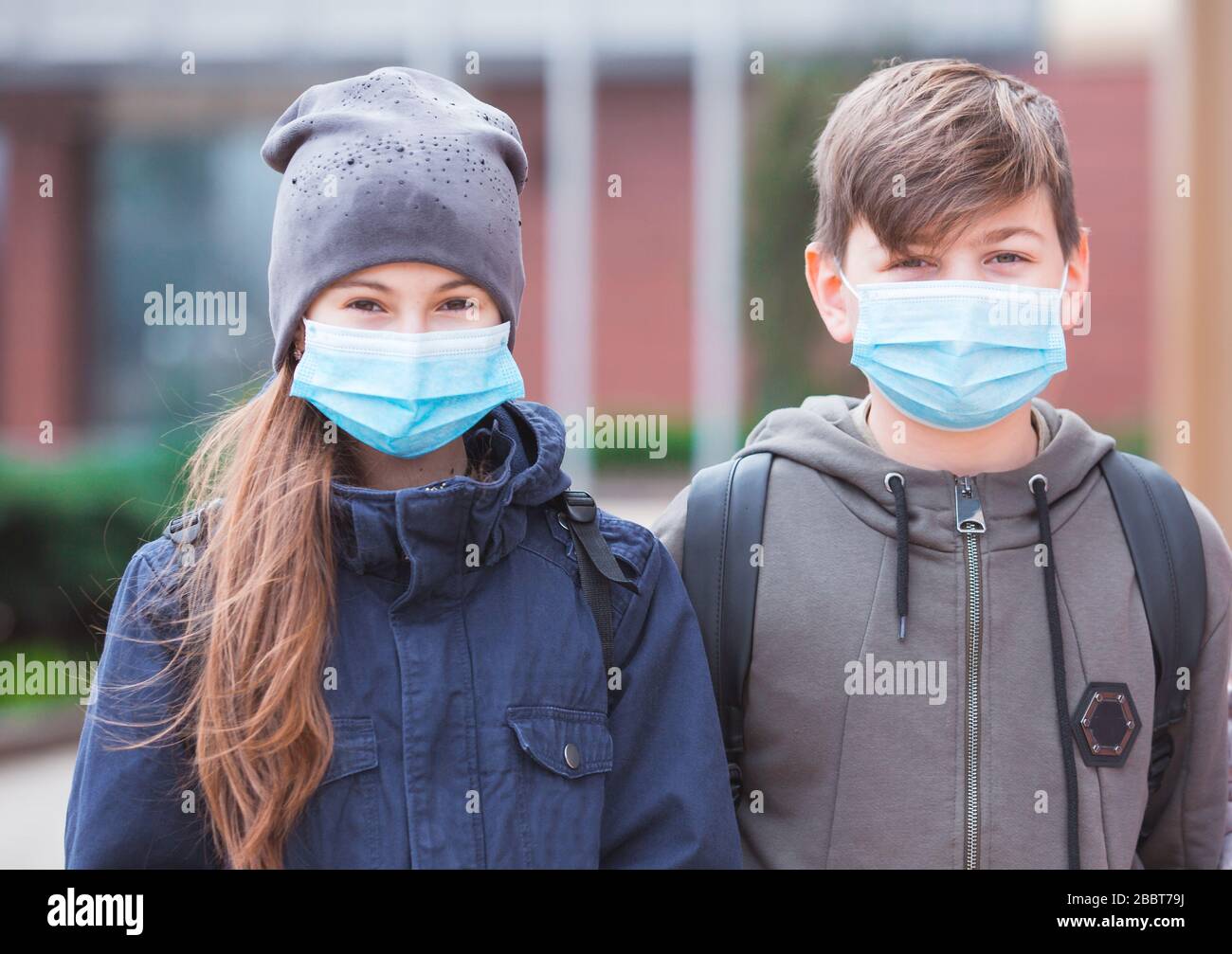 city residents adults and children observe quarantine and go in masks ...