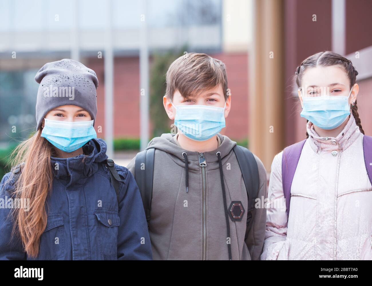 city residents adults and children observe quarantine and go in masks ...