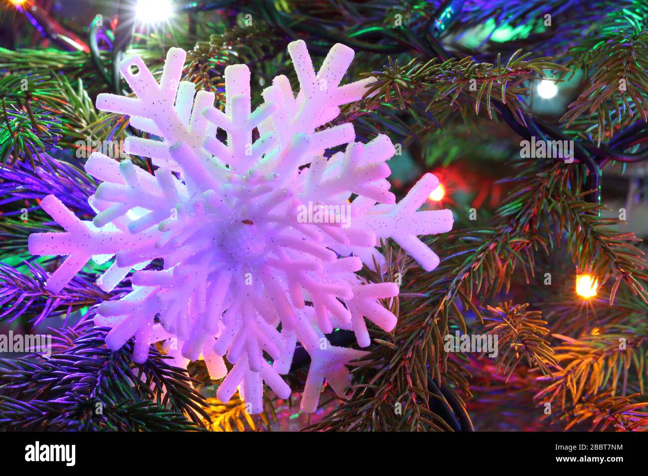 Artificial snowflake as a Christmas tree ornament during one of ...
