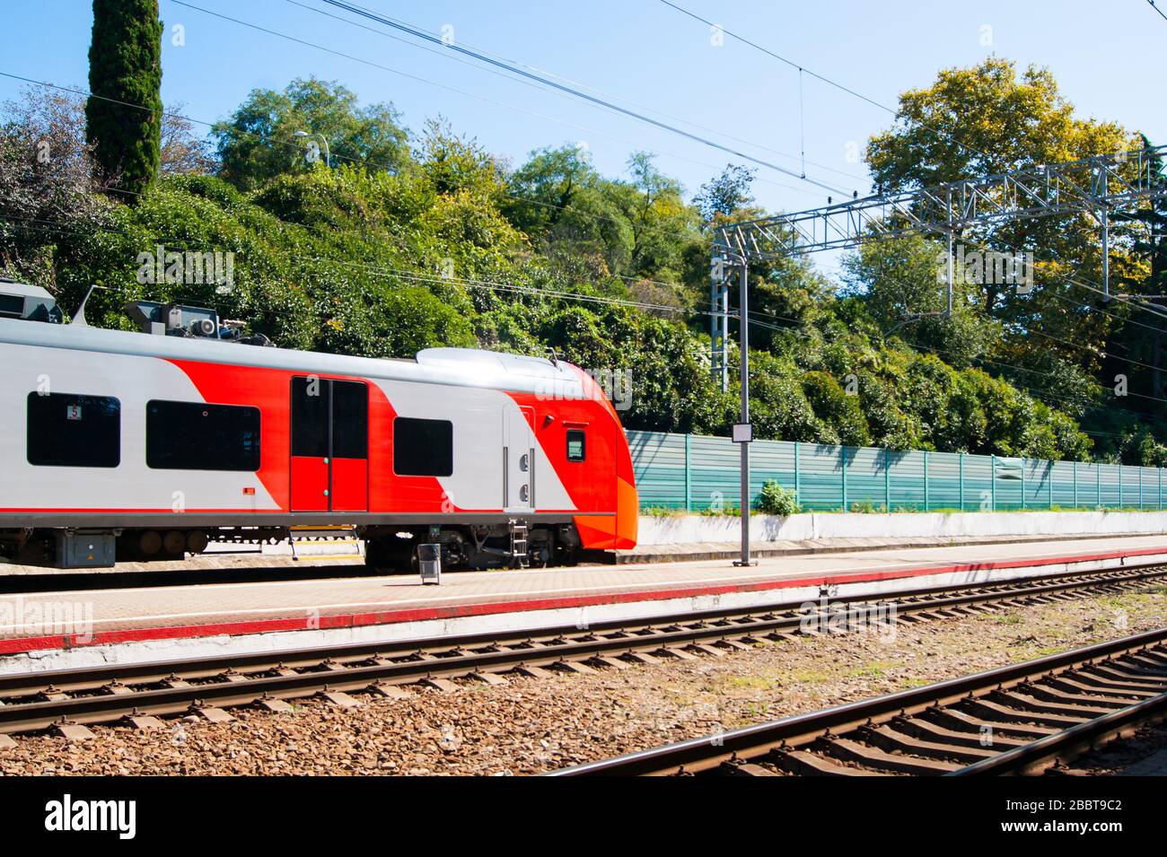 The train arrived at the station. Summer day, railway, travel ...