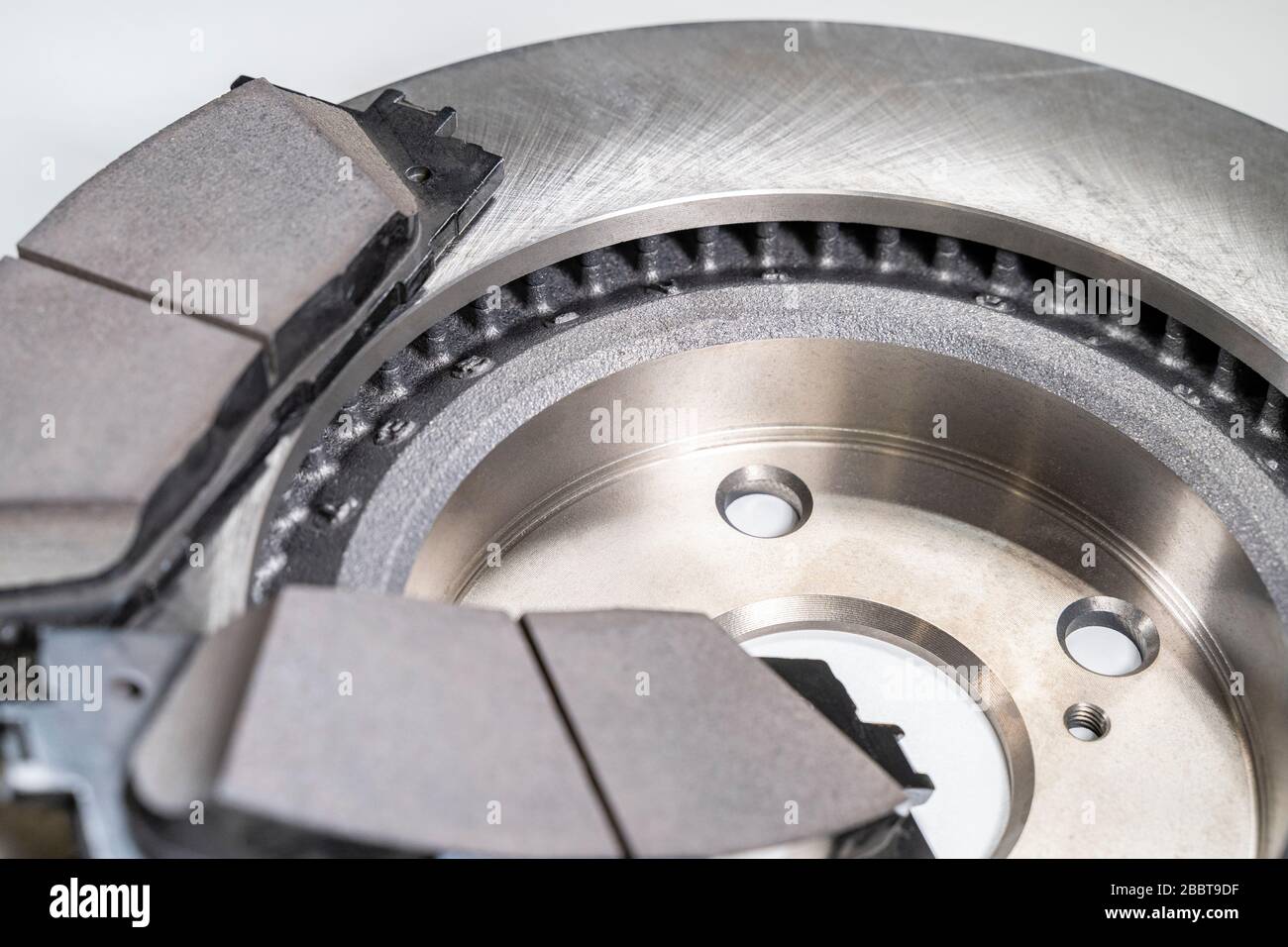 brake pads and auto parts on a white table Stock Photo - Alamy