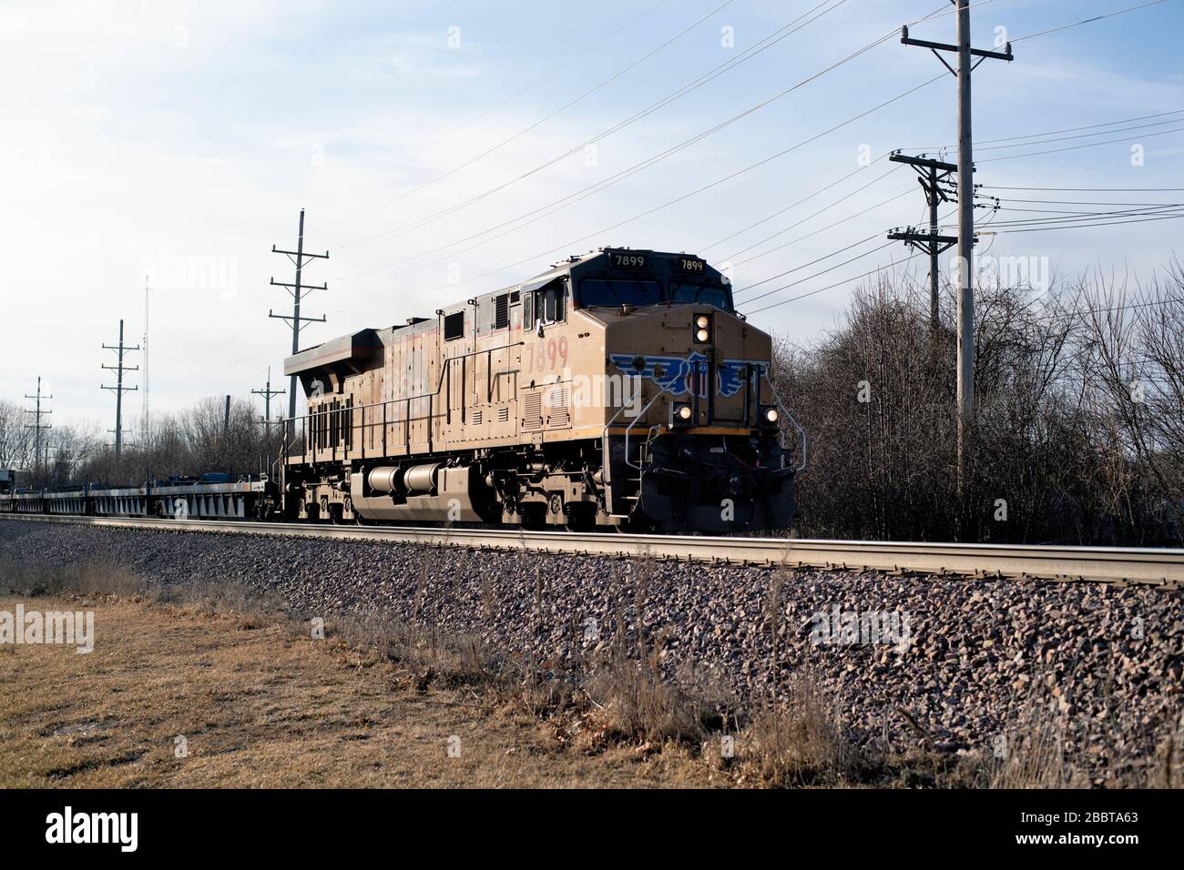 Geneva, Illinois, USA. A single locomotive leading a string of empty ...