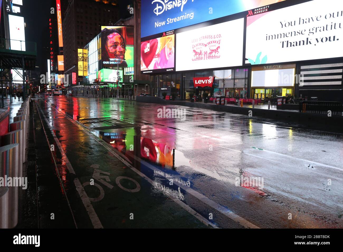 New York, USA. 31st Mar, 2020. An empty Times Square on a rainy night ...