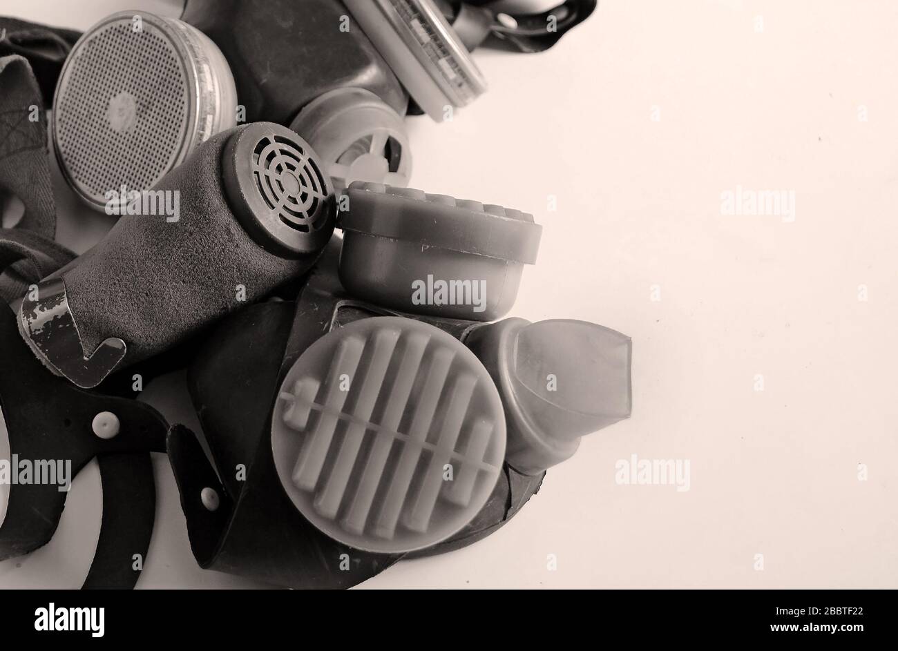 Close-up photo of old-style respirators on a white background in ...