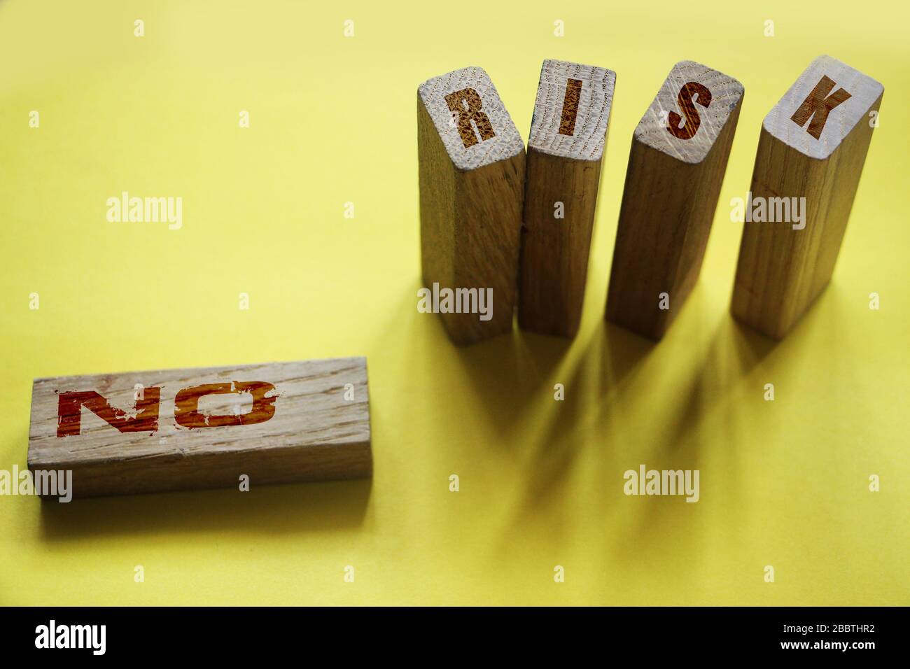 No risk wotds on wooden blocks. Investment risky assets financial ...