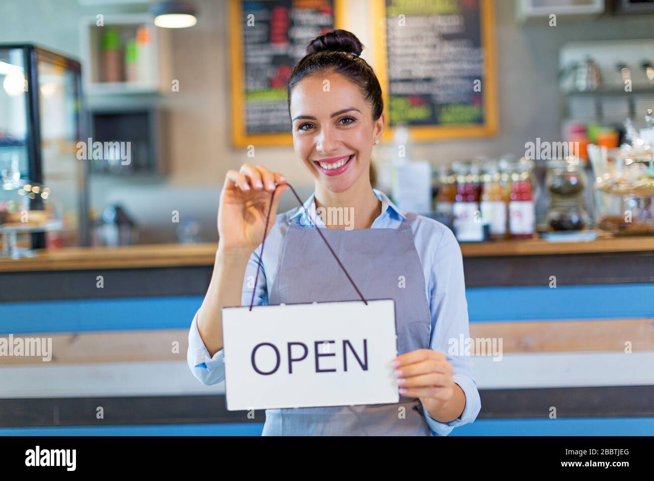 Working in coffee shop hi-res stock photography and images - Alamy