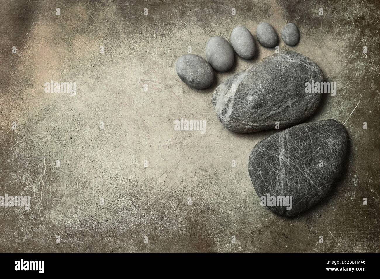 background image - Foot shape by stone Stock Photo - Alamy