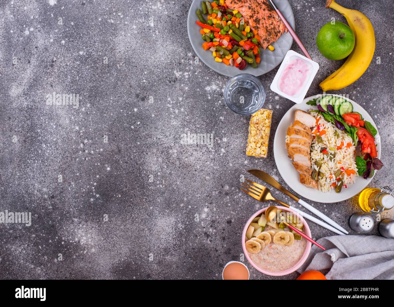 Breakfast, lunch and dinner. Balanced menu Stock Photo - Alamy