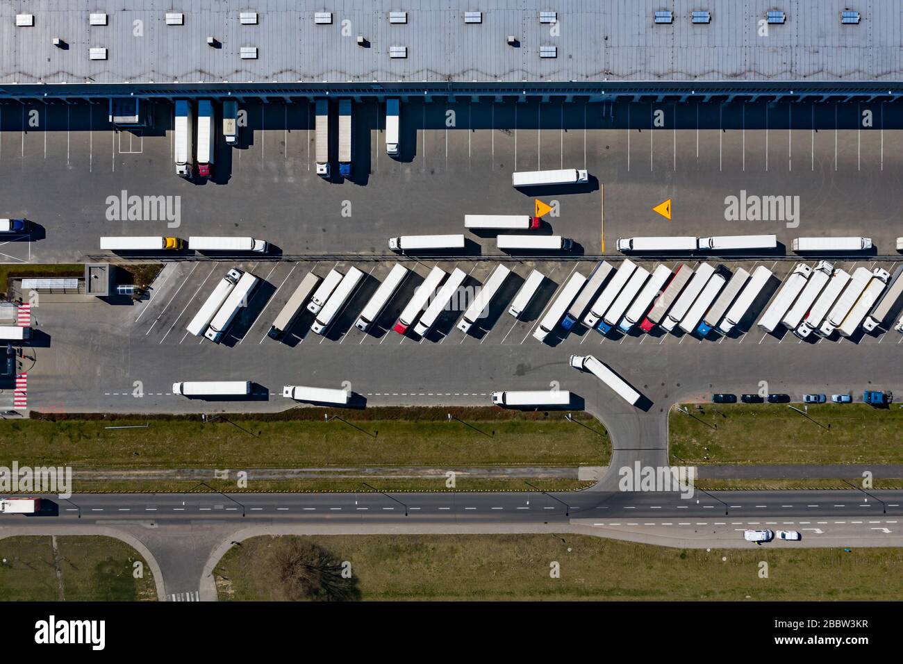 Aerial drone on trucks and logistic center. Warehouse aerial Stock ...