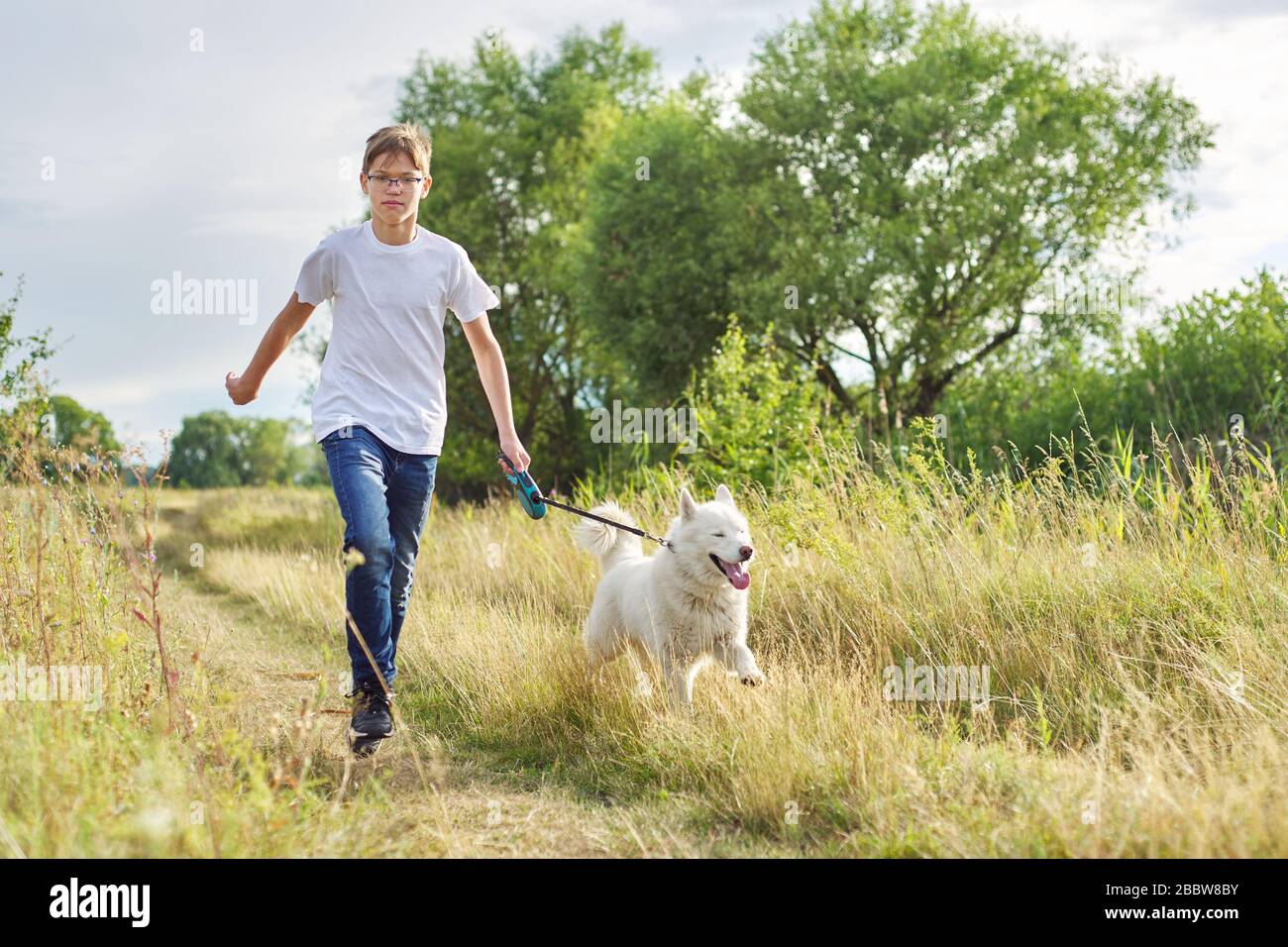 Teen boy running hi-res stock photography and images - Alamy