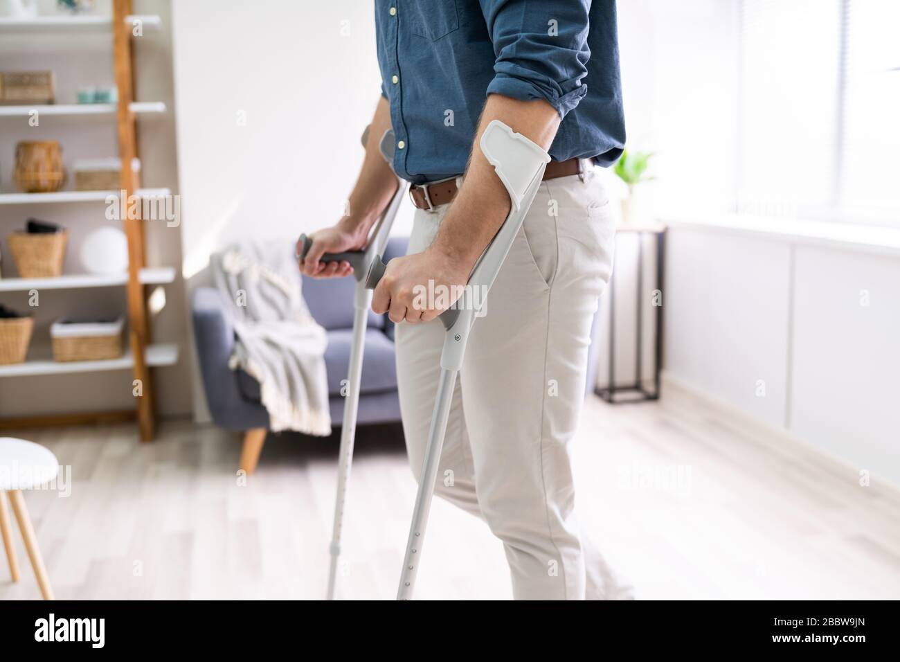 Using crutches hi-res stock photography and images - Alamy