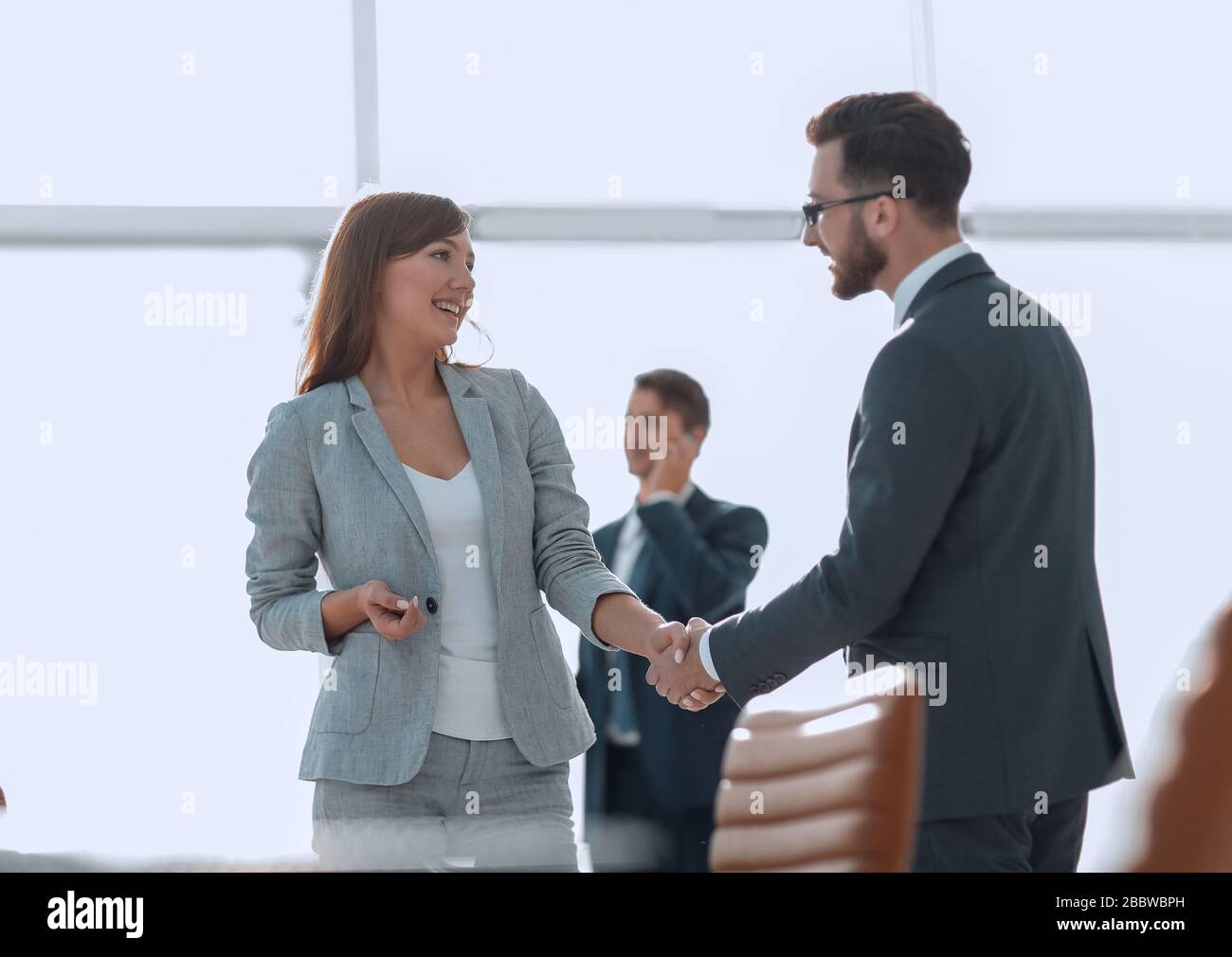 Handshake between manager client hi-res stock photography and images ...