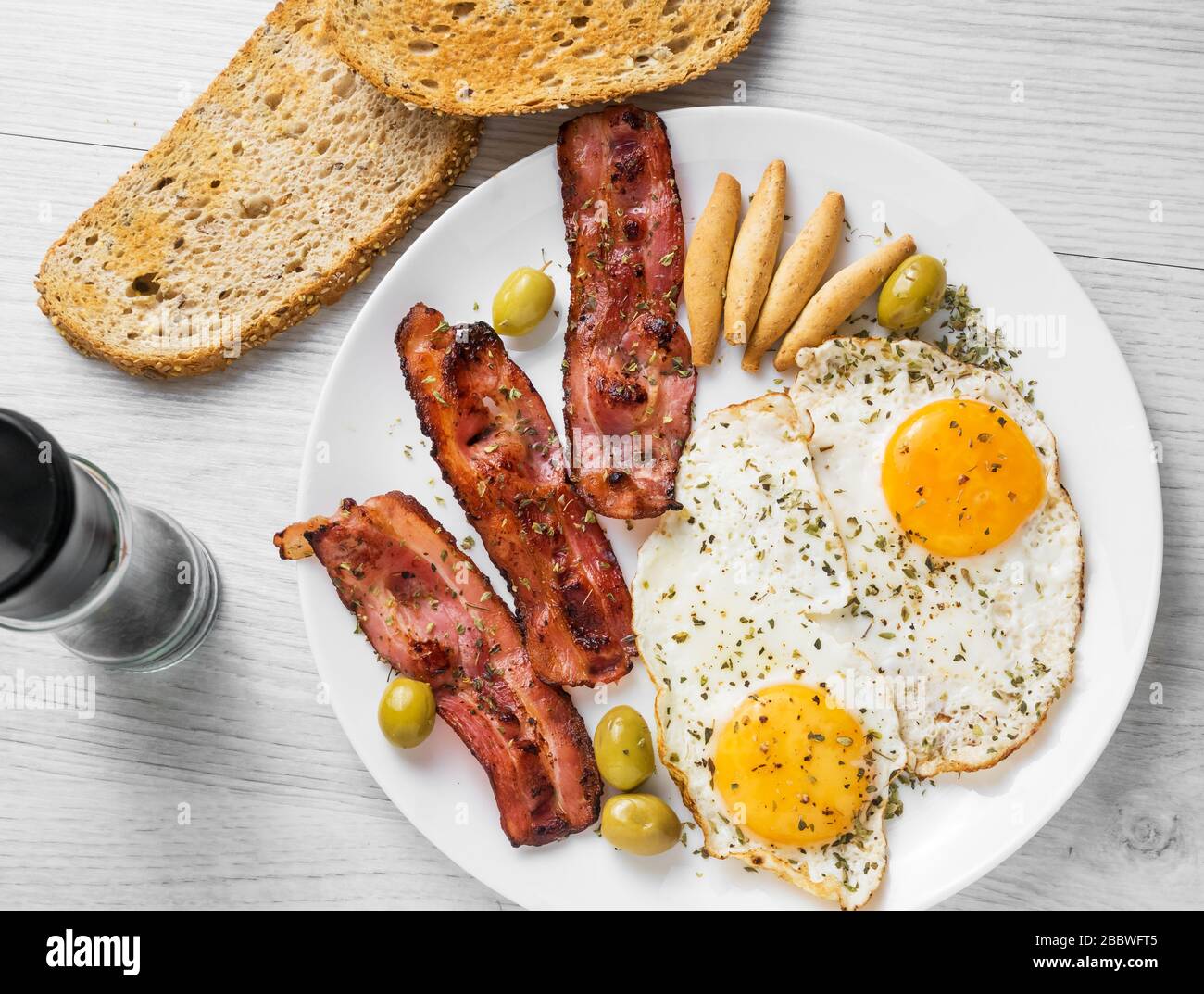 Delicious breakfast with roasted bacon and roasted eggs was ...