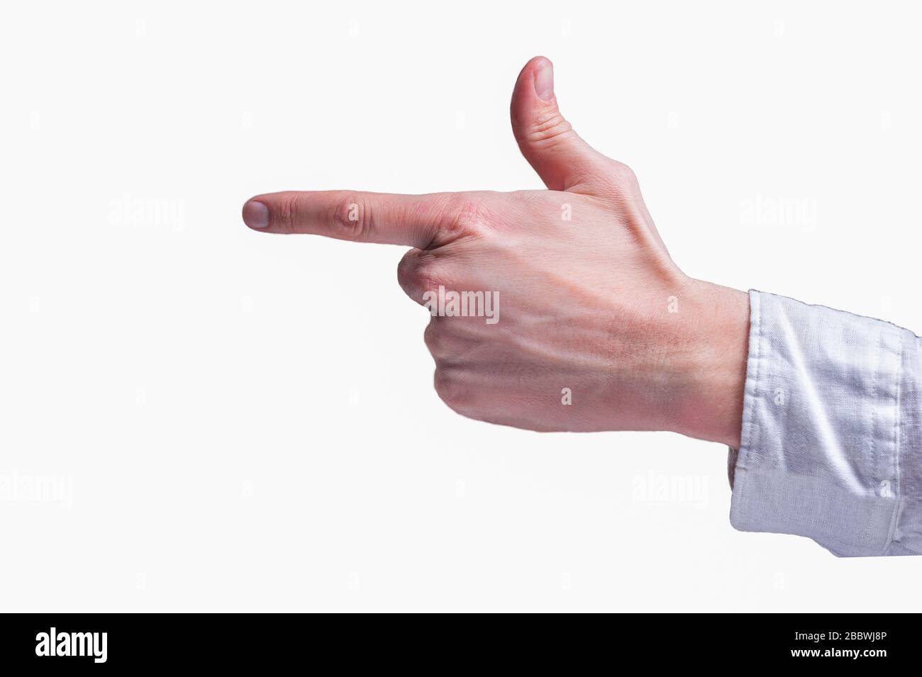 Human hand in a white shirt shows the finger gun sigh on isolated white ...