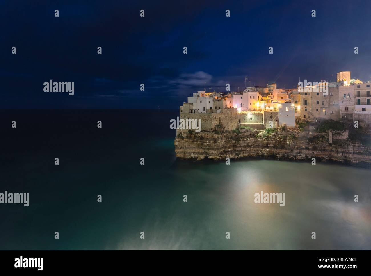 Sunset over Polignano a Mare, Italy Stock Photo - Alamy