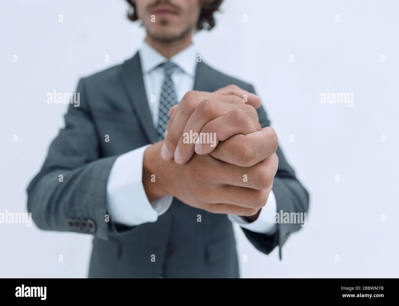 Close up on male clenched hands Stock Photo - Alamy