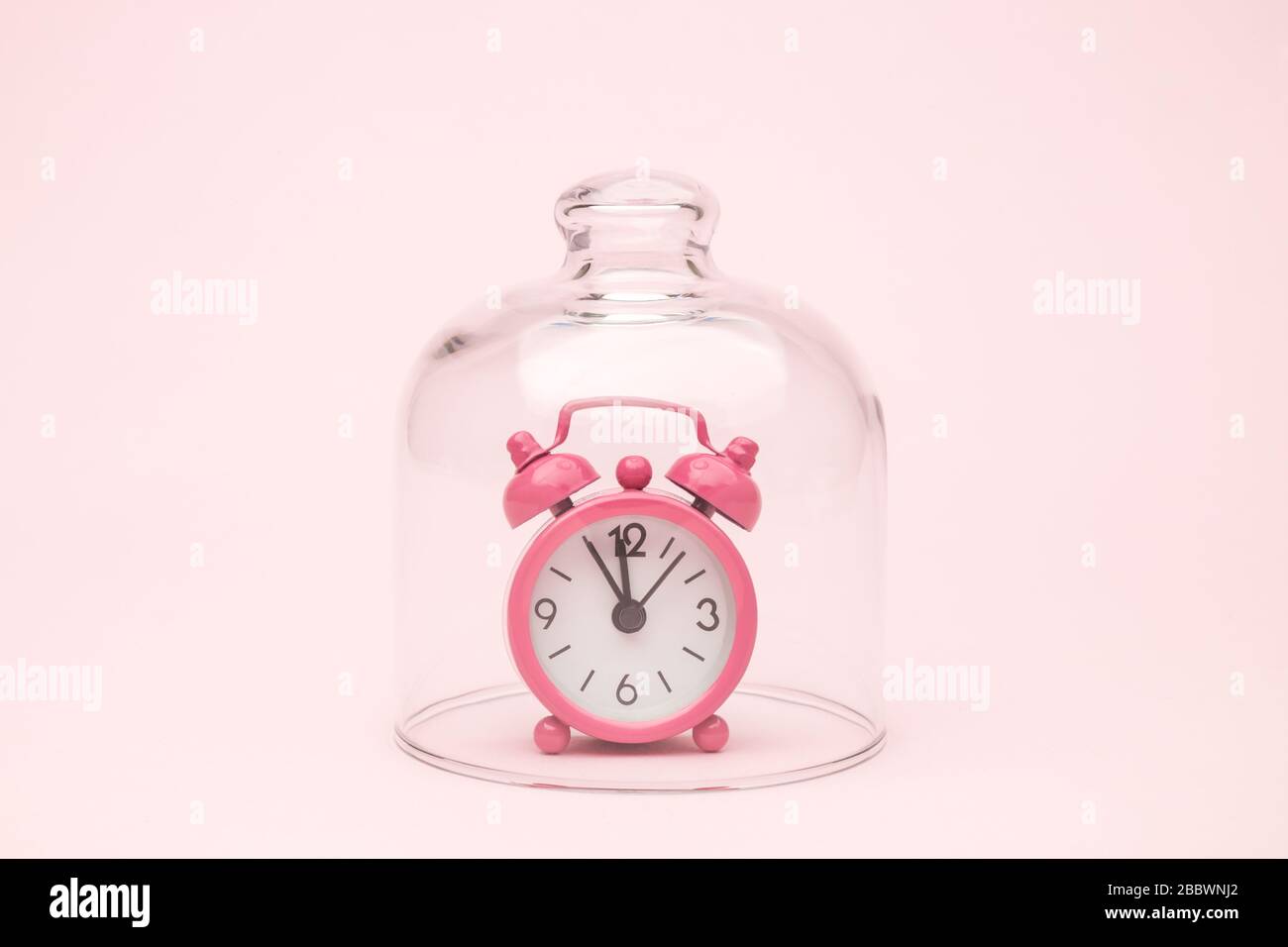 Alarm clock under glass cover quarantine minimal creative coronavirus ...