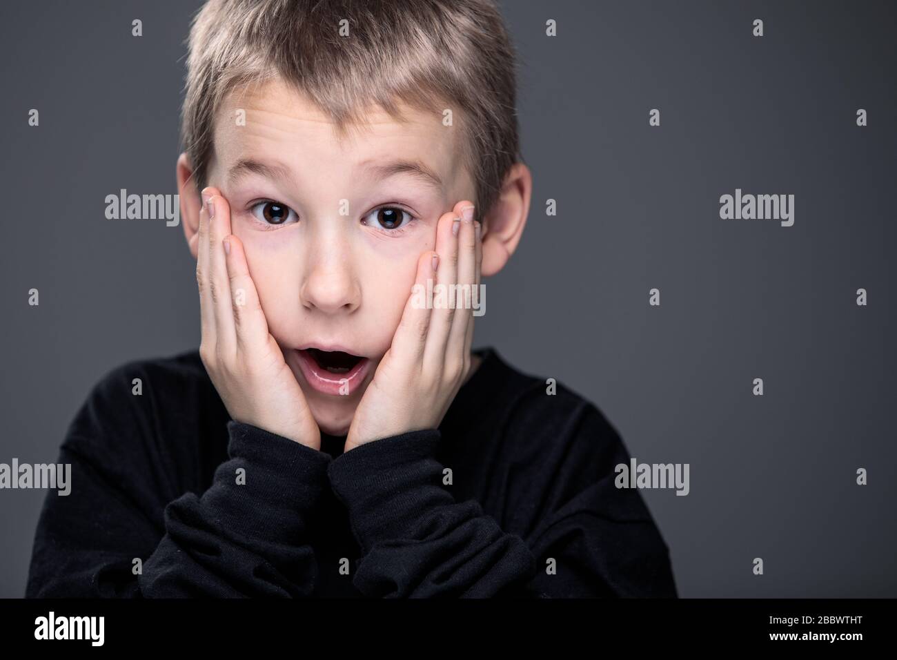 Grief-stricken little boy - feeling intense sorrow, remorse, sadnesss ...